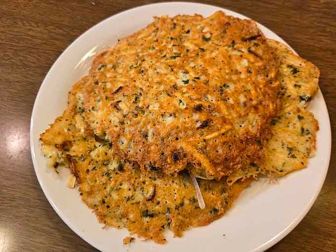 These golden, crispy potato pancakes are what happens when hash browns go to finishing school and graduate with honors.