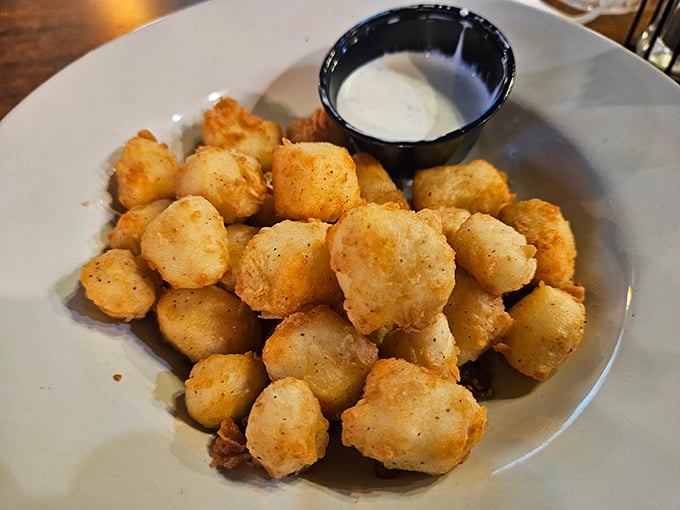 These golden cheese curds are what Wisconsin dreams are made of, crispy outside and squeaky-melty inside with every addictive bite.