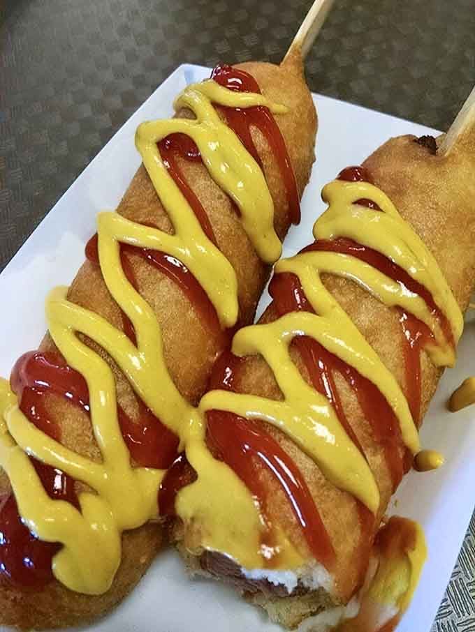 Mustard and ketchup zigzag across these beauties like edible art you're about to devour without guilt.