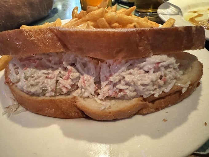 This sandwich doesn't just contain crab; it celebrates it. Chunky crab salad overflowing from hearty bread – the kind of lunch that makes you cancel afternoon plans.