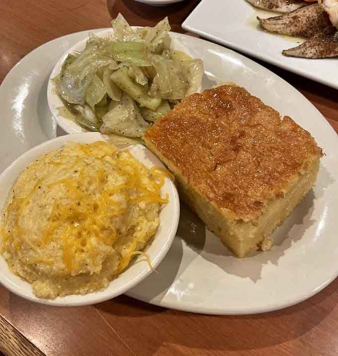 That cornbread square has the perfect golden crust that makes you understand why people write love songs about food.