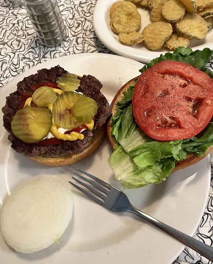 That burger with pickles and fresh tomato is proof that sometimes simple done right beats fancy every single time.