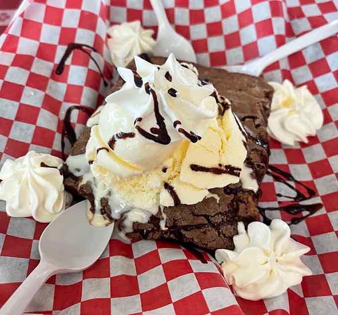 That brownie topped with ice cream and whipped cream isn't playing around with your dessert expectations at all.