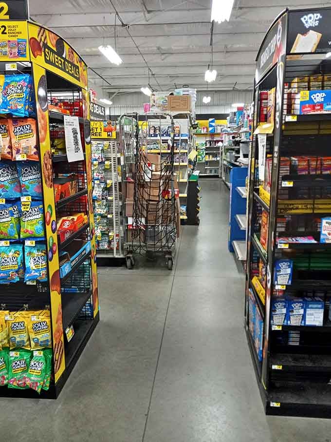 Aisles stretch invitingly forward, promising household essentials without the claustrophobic squeeze of cramped corner stores everywhere.