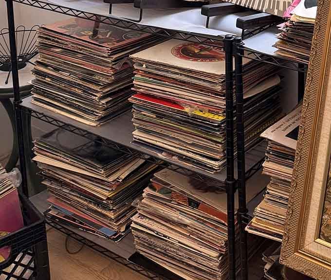 Vinyl records stacked thick as pancakes at Sunday brunch, waiting to spin nostalgia on your turntable again.