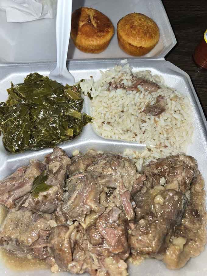 Oxtails falling off the bone with rice and cornbread, the kind of plate that makes you forget your own name.