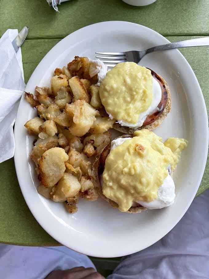 Eggs Benedict done right &ndash; perfectly poached eggs wearing hollandaise like a golden cape, ready to save your morning.