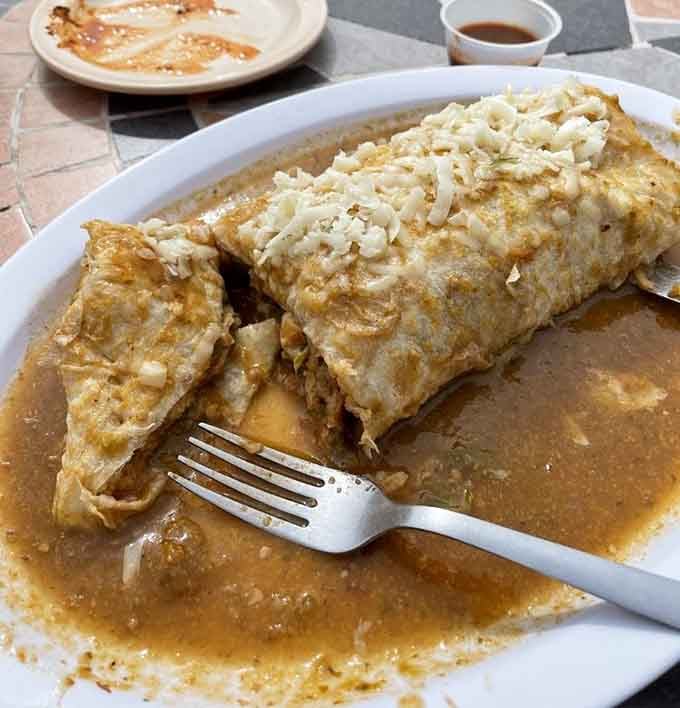 The chile relleno burrito is a masterpiece of stuffed pepper wrapped in tortilla, then bathed in liquid gold.