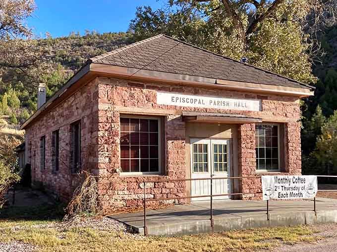 The Episcopal Parish Hall's rustic stone exterior has weathered a century of Wyoming seasons, still gathering folks for monthly coffee and conversation.