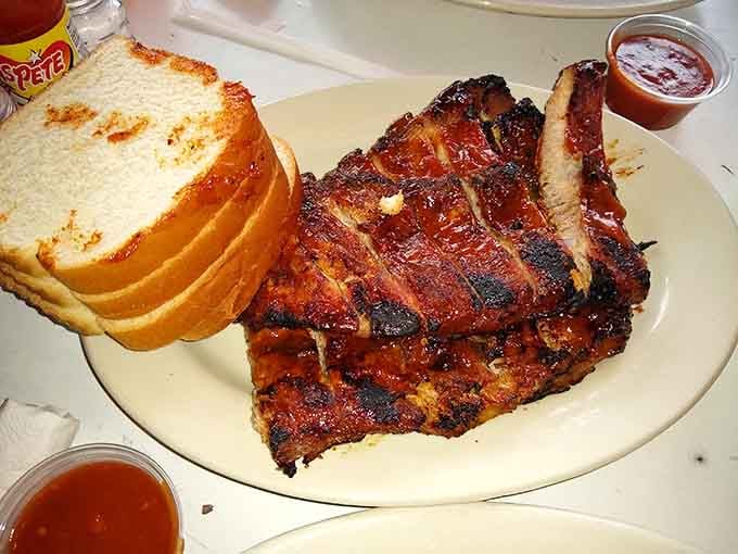Ribs and white bread, the classic Southern combination that's been solving hunger problems since forever and still going strong.
