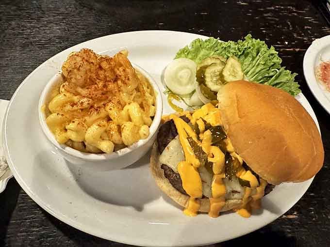 Mac and cheese that could make a grown adult weep paired with a burger that means business. Comfort food elevated without pretension.