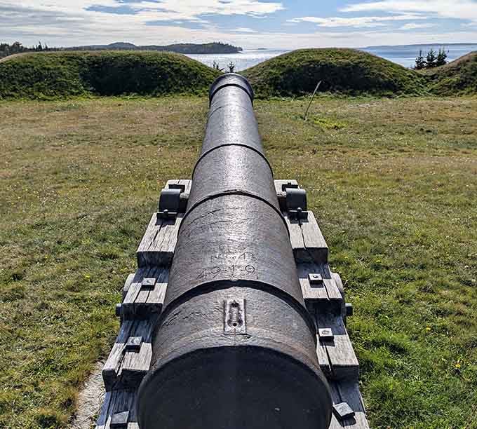 Fort Madison's cannon stands ready to defend the harbor, though these days it only battles the occasional seagull and selfie-taking tourist.
