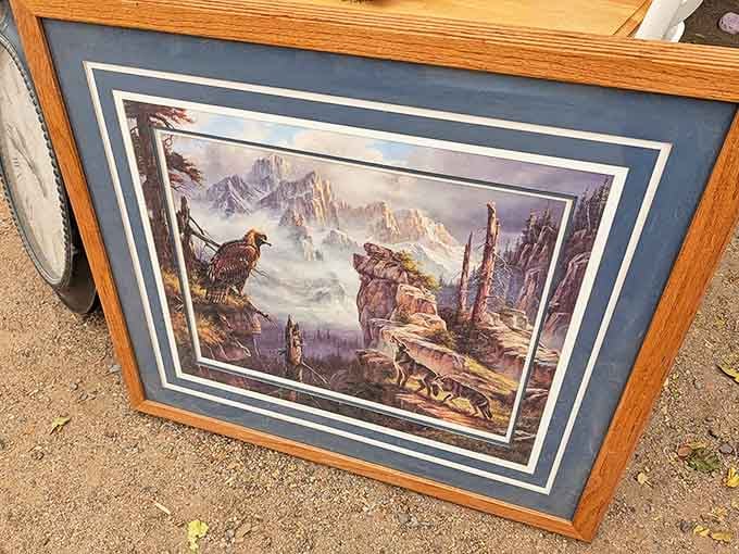 Wildlife art that captures the spirit of the Southwest. This framed mountain scene would look perfect above someone's knotty pine fireplace.