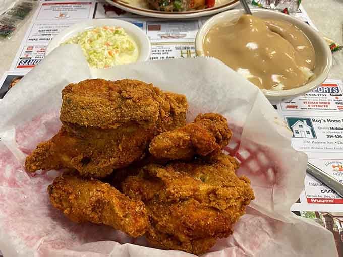 Golden-brown fried chicken that crackles when you bite it, paired with sides that remind you why comfort food earned its name.