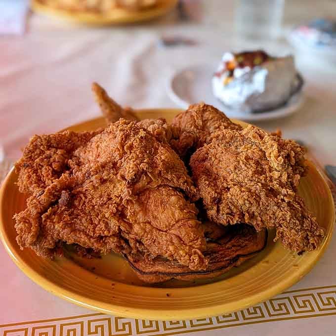 Golden fried chicken that could make a colonel jealous, piled high and ready to satisfy your deepest comfort food cravings.