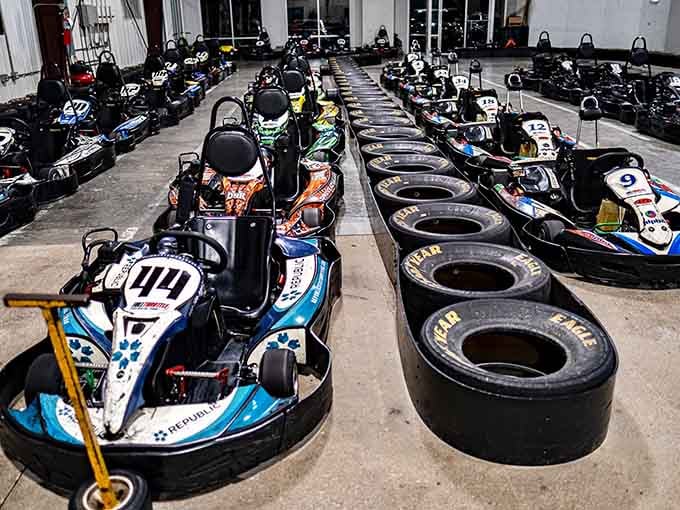 Rows of colorful karts stand ready for action, each one a potential ticket to glory and bragging rights.