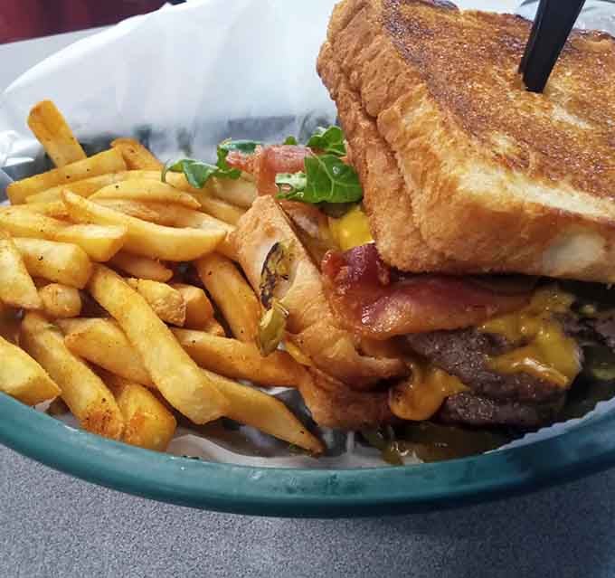 This patty melt comes loaded with melted cheese and grilled onions, proving comfort food transcends all galaxies.