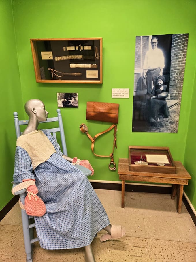 This display shows the restraints and safety measures once considered necessary, a sobering look at how patients were managed.
