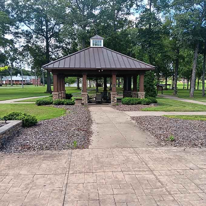 This park pavilion isn't trying to impress anyone, and that's precisely why it does. Simple pleasures in a green space where community happens naturally.