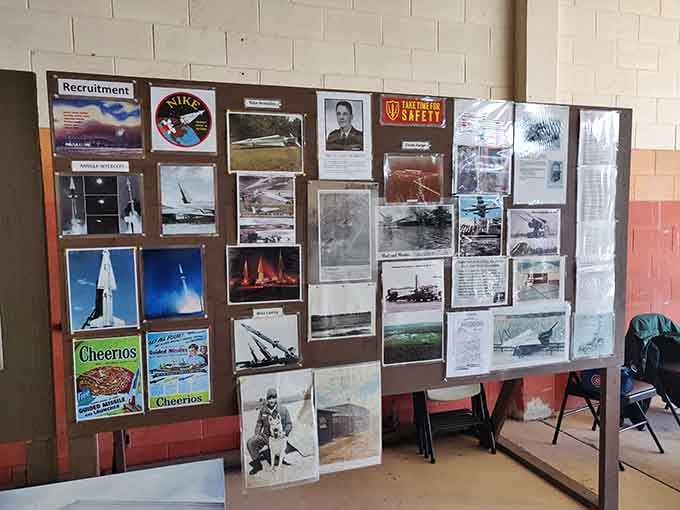 Historical photos and Nike patches remind you that real people operated this equipment. Talk about workplace pressure, right?