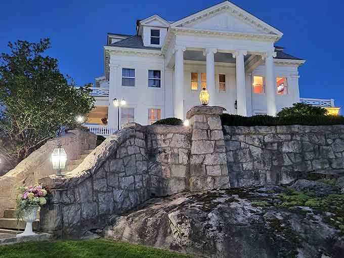 The Haley Mansion glows at twilight like something from a New England fairy tale. F. Scott Fitzgerald would approve of this grand dame overlooking the water.