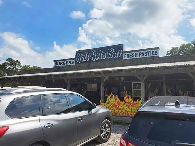The Hell Hole Bar serves burgers and fresh pastries, because apparently eternal damnation includes surprisingly good comfort food options.
