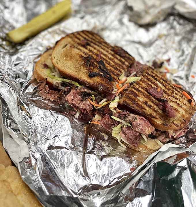 That's not a sandwich filling, that's a mountain range of perfectly seasoned pastrami waiting to happen.