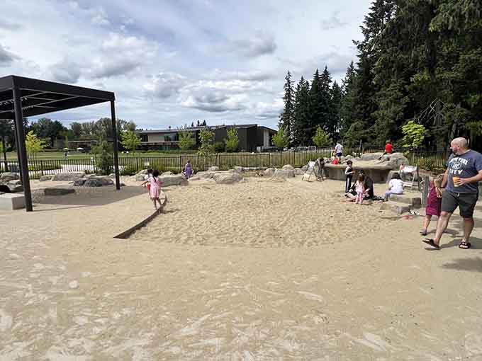 The sand pit offers endless construction possibilities, where tiny architects build empires that last until tomorrow's rain.