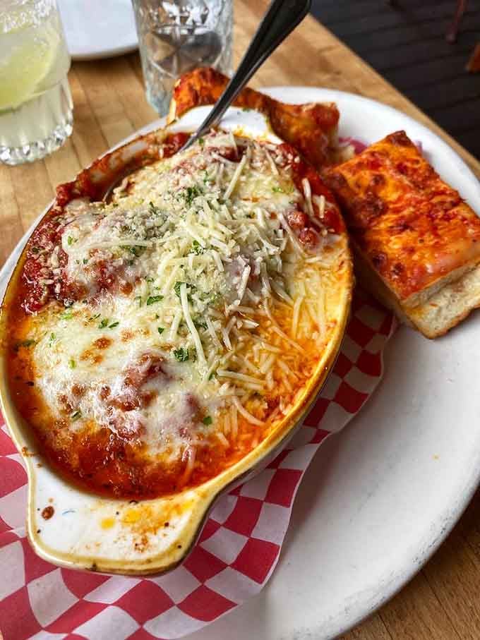 Four half-pound meatballs swimming in marinara is the kind of math problem everyone wants to solve at lunchtime.