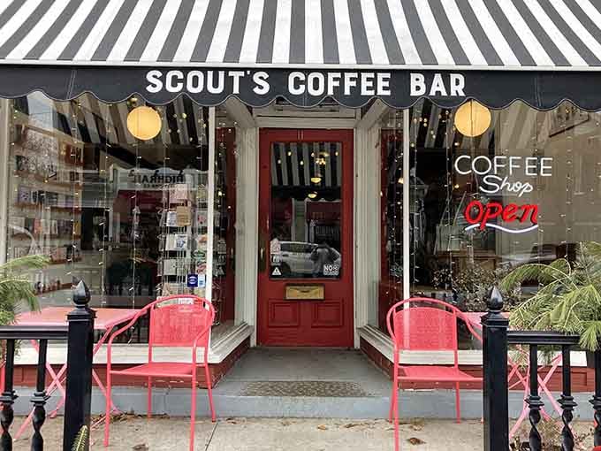 That striped awning and red door practically beg you to come in for coffee and stay for conversation.