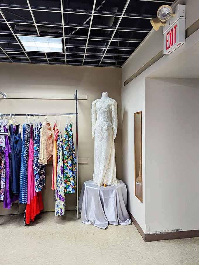 That vintage wedding dress on display proves someone's special day can become your spectacular deal decades later.