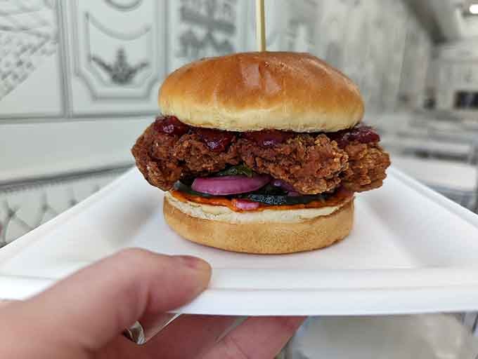 This chicken sandwich means business, stacked high and ready to satisfy even the most demanding appetite.