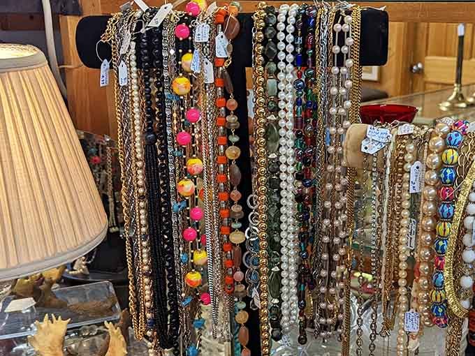 A jewelry lover's dream—where beads and baubles from every decade hang like colorful memories waiting for their second act.