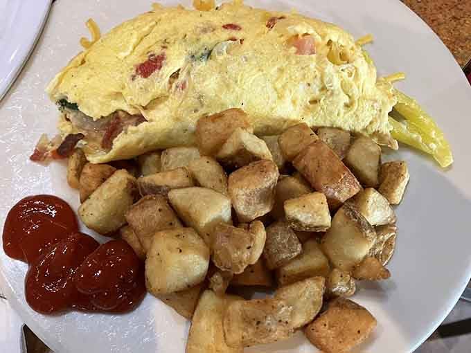 Josie's Dad's omelet arrives loaded with everything delicious, making you wonder why all omelets aren't this good.