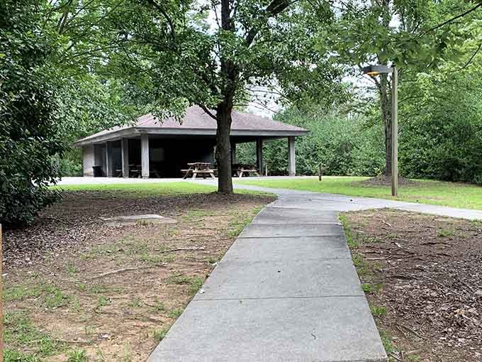 The park pavilion stands ready for gatherings where families create memories without needing Wi-Fi or electrical outlets to succeed.