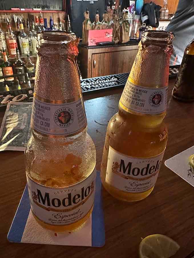Two Modelos sweating on the bar is the international symbol for "good times are about to happen here."