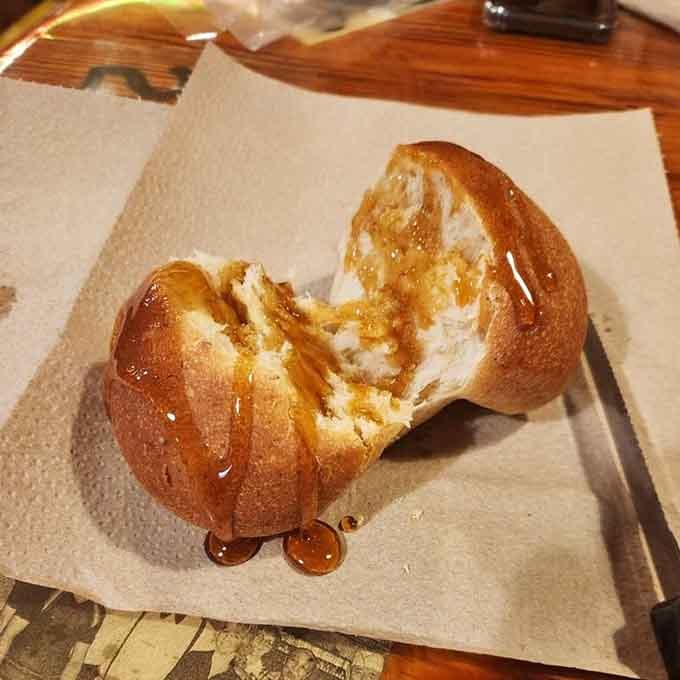 That golden roll drizzled with sorghum molasses is basically Missouri's answer to liquid happiness on bread.