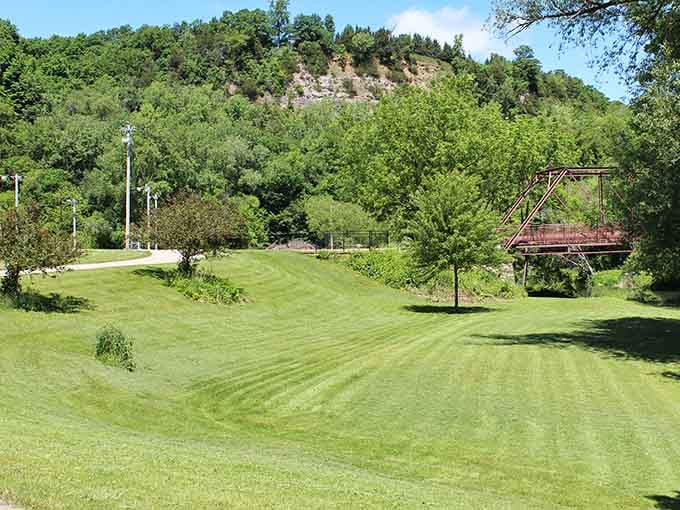 Manicured lawns meet limestone cliffs in a landscape combo that shouldn't work but absolutely does, like peanut butter and pickles.