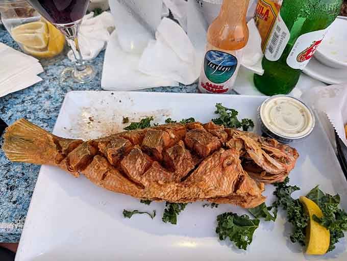 Whole fried fish so beautifully golden and perfectly crisped, it deserves its own vacation postcard and Instagram account.