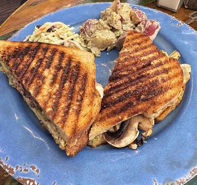 A panini pressed to crispy perfection, proving that melted cheese and artichoke hearts make everything better in life.