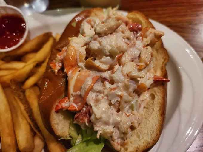The lobster roll &ndash; New England's gift to sandwich architecture &ndash; features chunks of sweet Maine lobster that make you understand why people fought for this coastline.