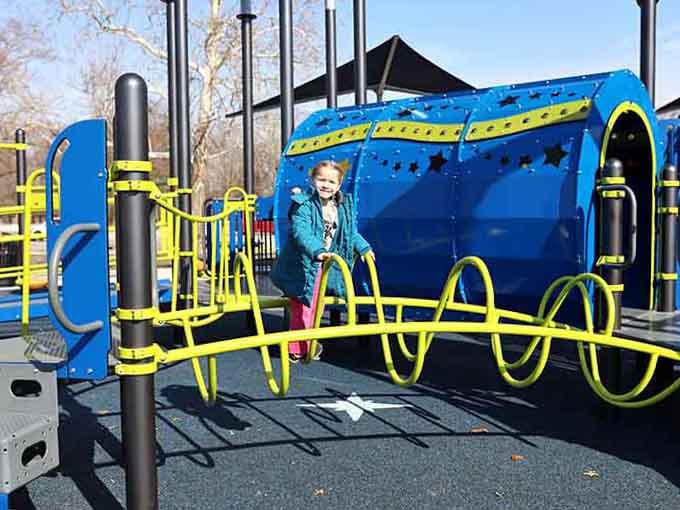 The blue tunnel structure invites kids into a world of imagination where every crawl-through becomes an epic space mission.