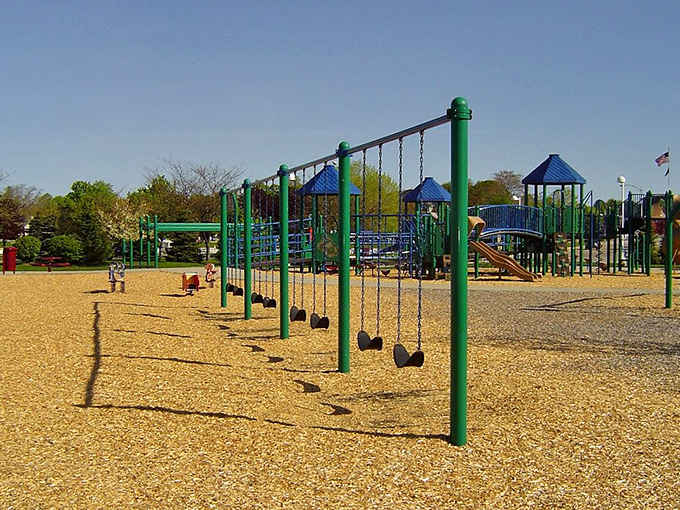 A playground where kids can burn off energy while parents contemplate the important question: beach first or ice cream?