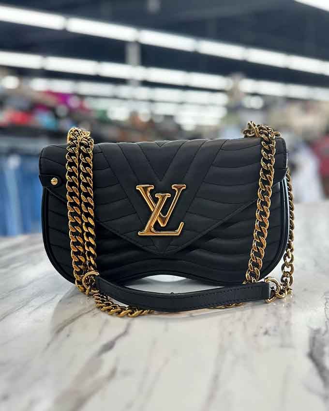 A Louis Vuitton that doesn't require a second mortgage? This is the stuff thrift store dreams are made of.