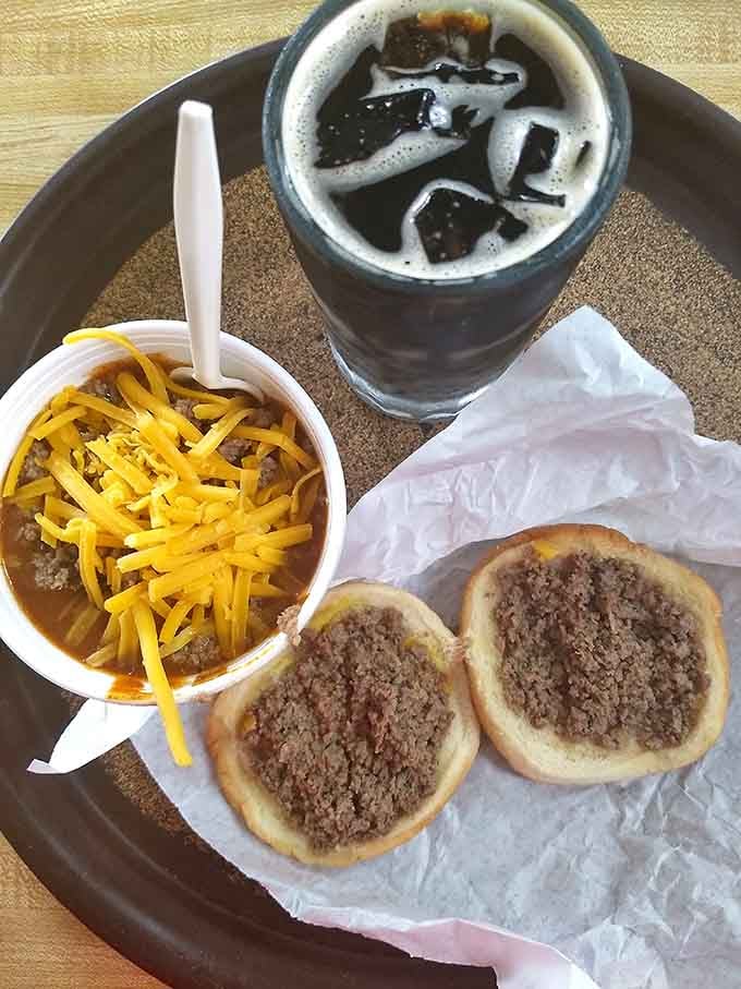 The holy trinity of Midwestern comfort: steamed meat, homemade chili, and an ice-cold root beer to wash it down.