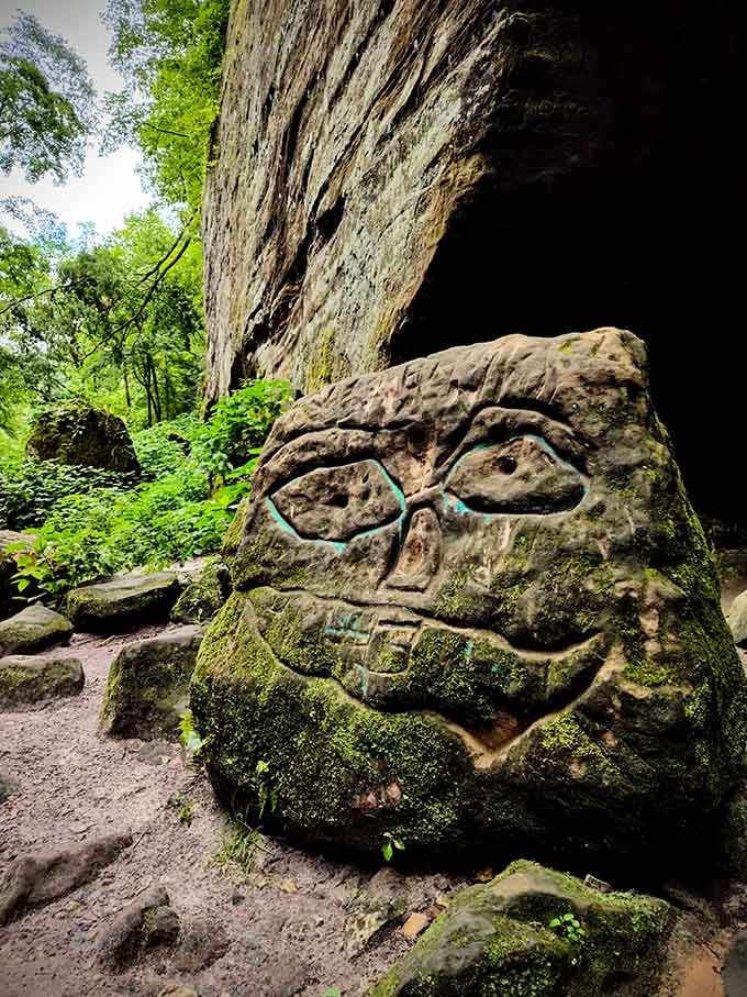 Someone carved a face into this rock, because apparently ancient artists had a sense of humor too.