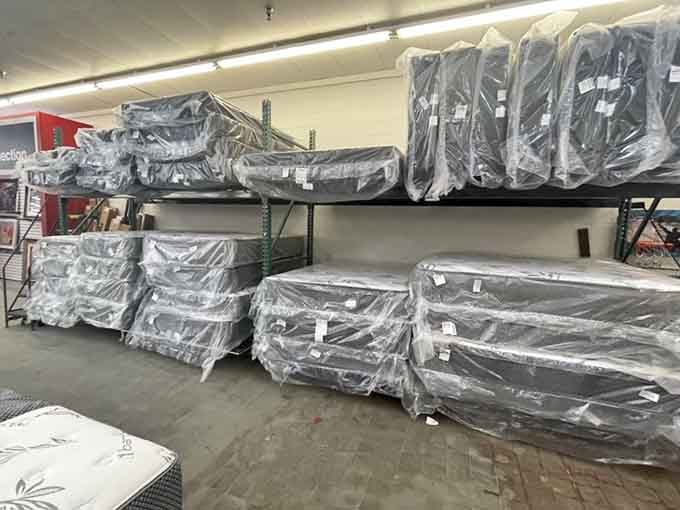 Brand new mattresses wrapped and ready, because even thrift stores know you deserve a good night's sleep.