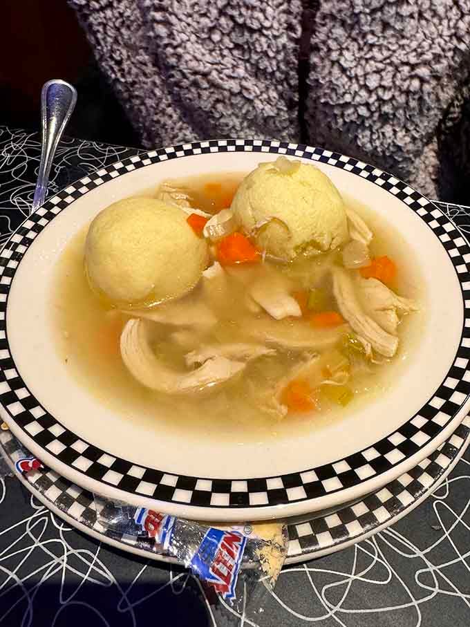 Matzo ball soup that could cure anything from a common cold to existential dread—those fluffy dumplings floating like clouds in chicken broth paradise.