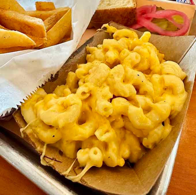 Mac and cheese so creamy and golden, it makes you wonder why anyone ever bothered inventing other side dishes.