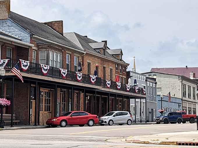 Patriotic bunting and historic buildings create a streetscape that Norman Rockwell would have absolutely loved to paint on repeat.
